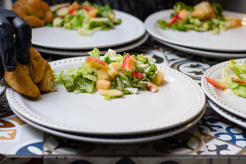 Hand Serving Food on a Plate. Catering Service Stock Photo - Image of ...