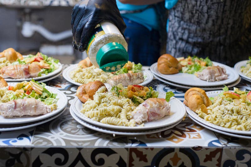 Hand Serving Food on a Plate. Catering Service Stock Photo - Image of ...