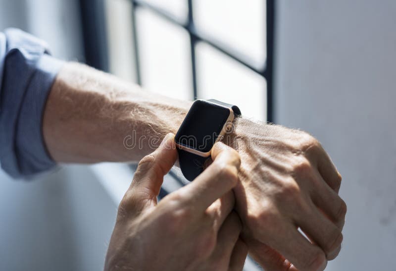Hand Setting a Smartwatch on Another Hand Stock Photo - Image of hand ...