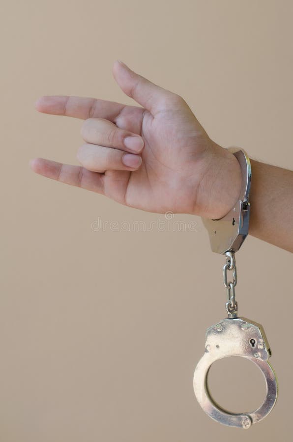 Hand in shackle stock photo. Image of prisoner, people - 56251162