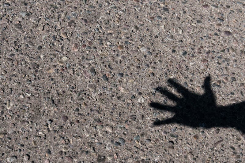 Hand Shadow on Asphalt Texture Stock Photo - Image of grain, texture ...