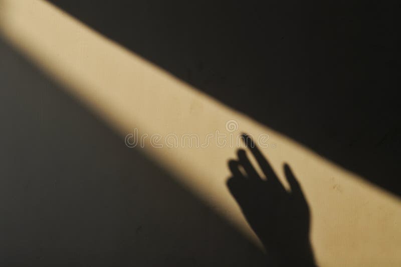 Hand shadow on a wall. stock image. Image of shadow - 193616067