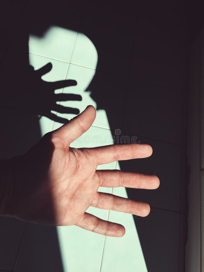 Hand in the shadows stock image. Image of body, minimal - 144016649