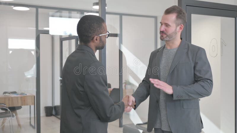 The Hand Shake by Multi Ethnic People in Office Stock Footage - Video ...