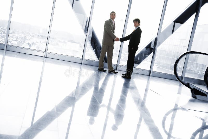 Hand shaking stock photo. Image of handshake, building - 5766580