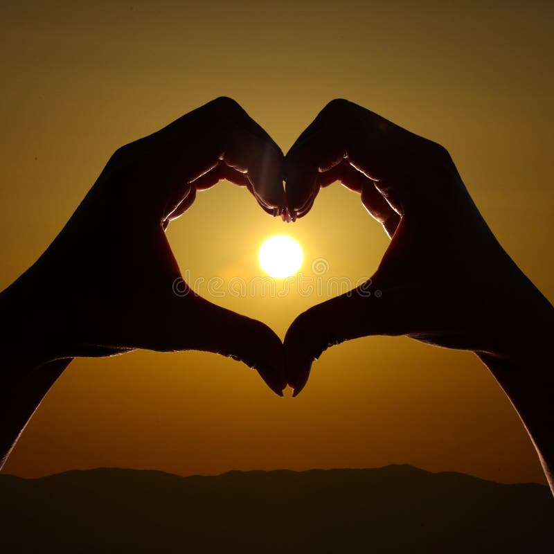 Hand Shaped Heart Against Sunset Stock Photo - Image of love, holiday ...