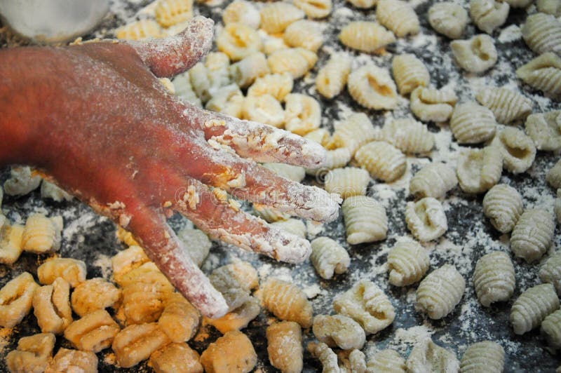 Hand Shaping Fresh Gnocchi on Floured Surface, Showcasing Pasta-making ...