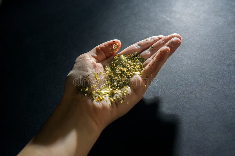 The Hand with Shining Sparkles on Black Stock Photo - Image of edge ...