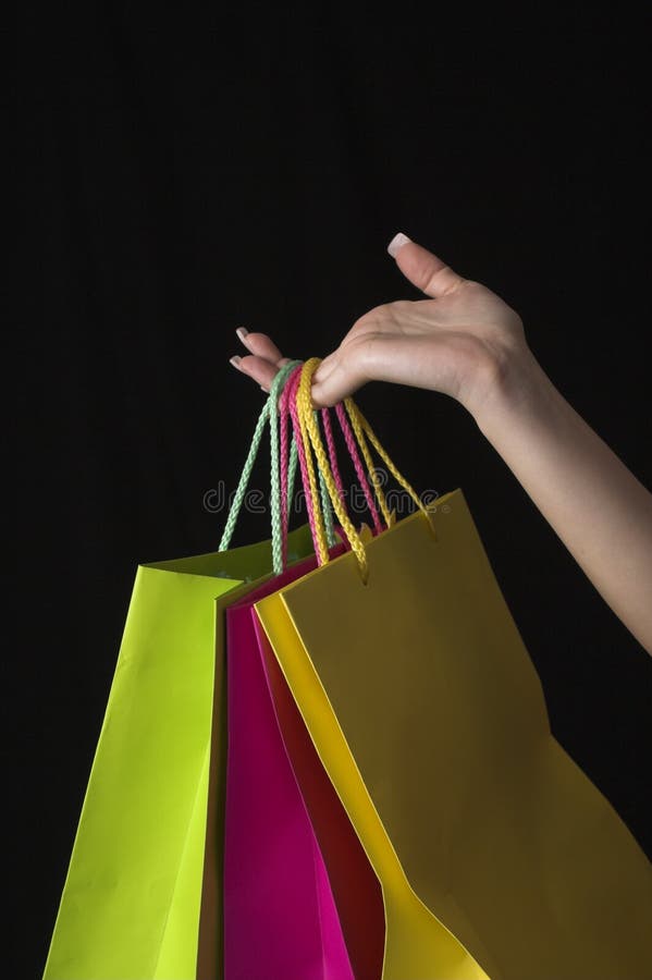 Hand and shopping bags stock photo. Image of hold, isolation - 2446892