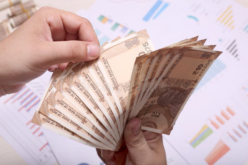 Hand Showing Spread of Indian 10 Rupee Currency Notes Stock Image ...