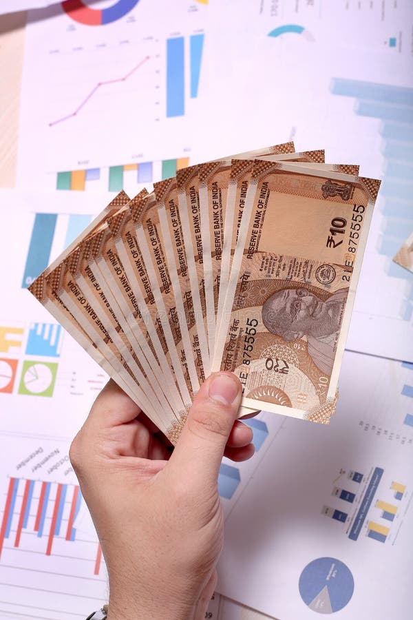 Hand Showing Spread of New Indian 10 Rupee Currency Notes Stock Image ...