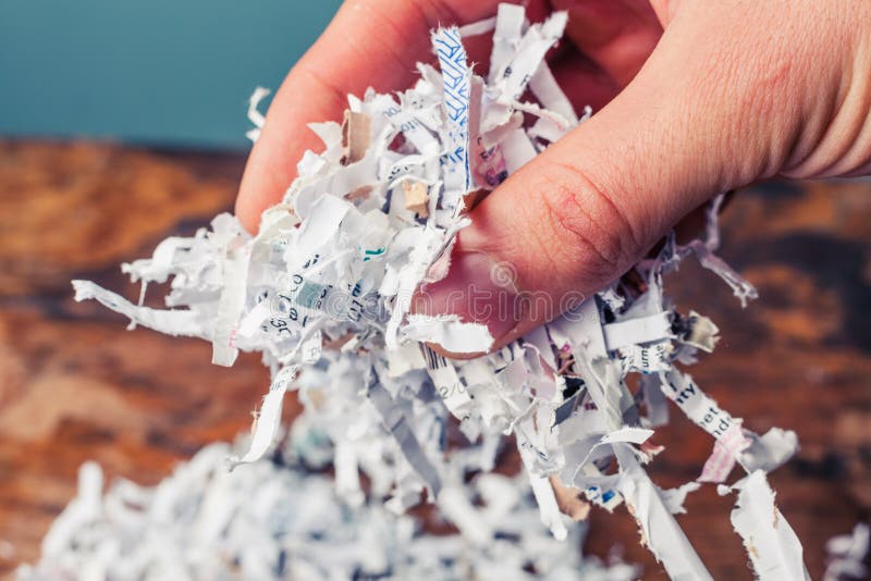 Hand with shredded paper stock photo. Image of torn, waste - 37871132