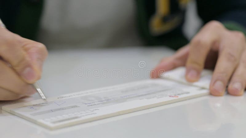 The Hand Signing a Cheque in Bank Stock Footage - Video of signature ...