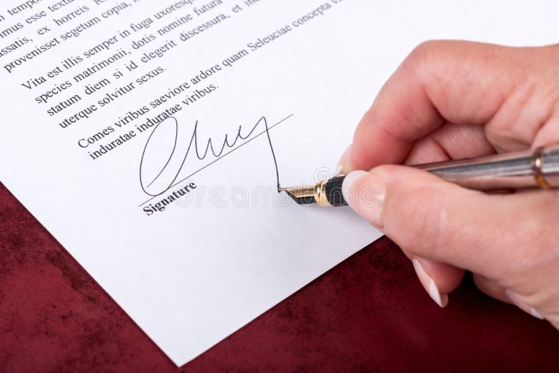 Hand signing a contract stock image. Image of statement - 58786617