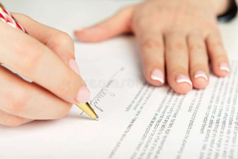 Hand signing a contract stock photo. Image of manager - 92877722