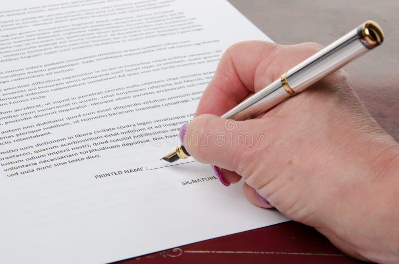 Hand signing a paper stock image. Image of business, note - 41412917
