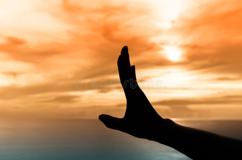 Hand Silhouette Under Sunset Stock Photo - Image of hands, orange: 40827956