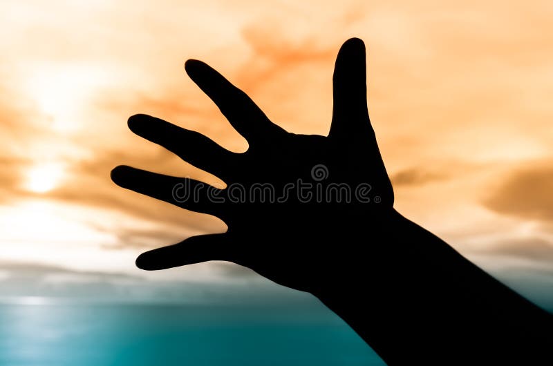 Hand Silhouette Under Sunset Stock Photo - Image of hands, orange: 40827956