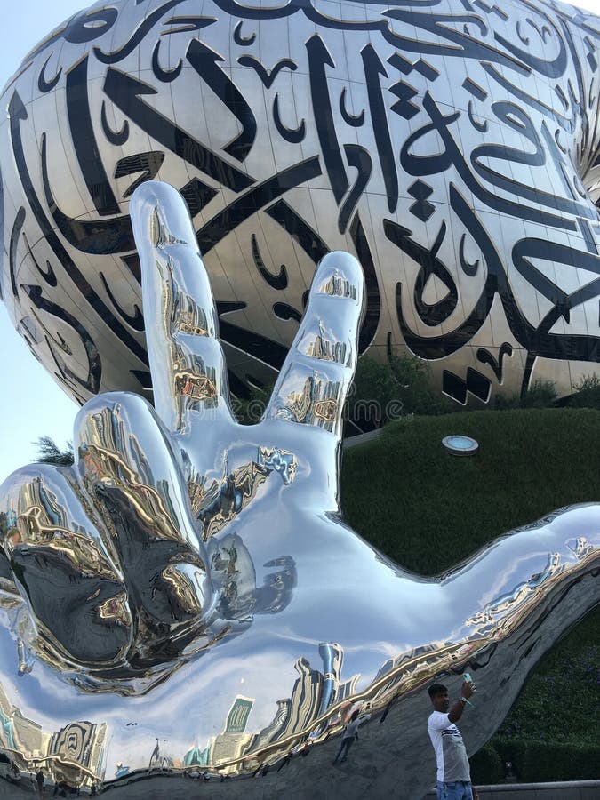 Hand silver statue dubai editorial photo. Image of silver - 365634581