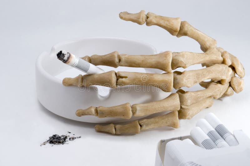 Hand Skeleton with Cigarette Stock Photo - Image of care, habit: 20439358