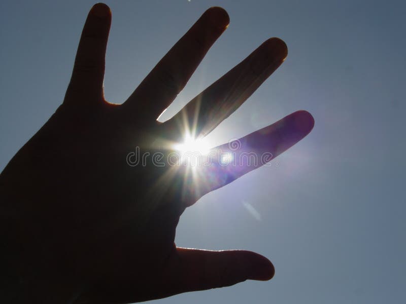 Hand on the sky with sun stock photo. Image of hand, background - 89774702