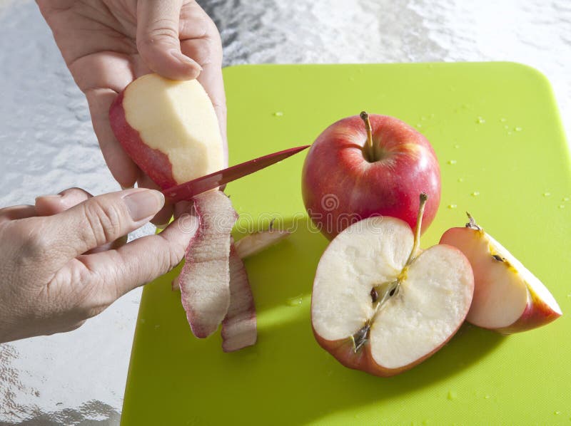 Hand sliced apples peel stock image. Image of hand, natural - 60689115