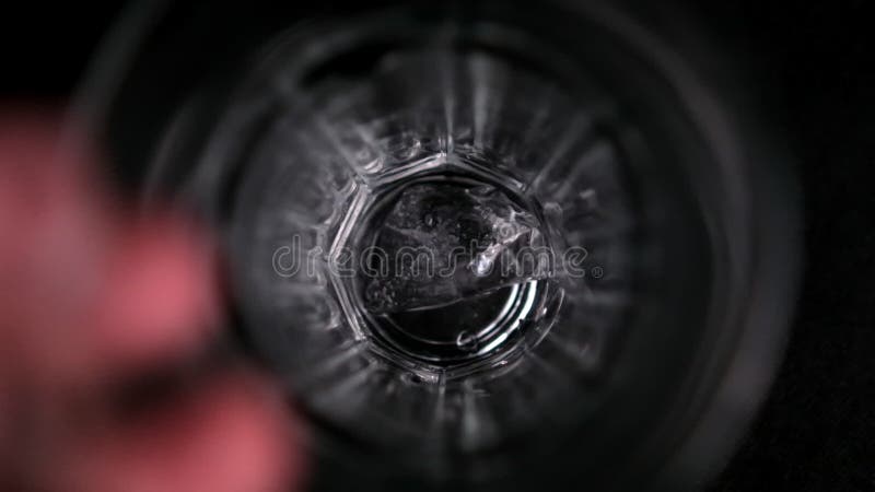 Hand Slowly Dropping Ice Cube Inside a Glass Stock Video - Video of ...