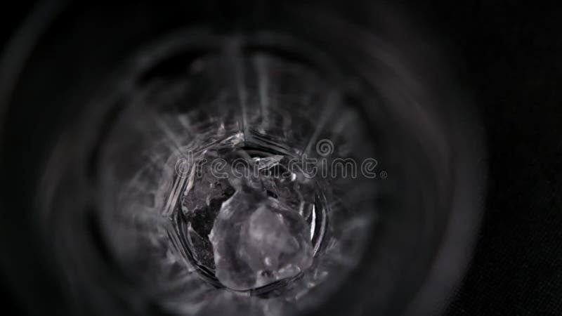 Hand Slowly Dropping Ice Cube Inside a Glass Stock Footage - Video of ...