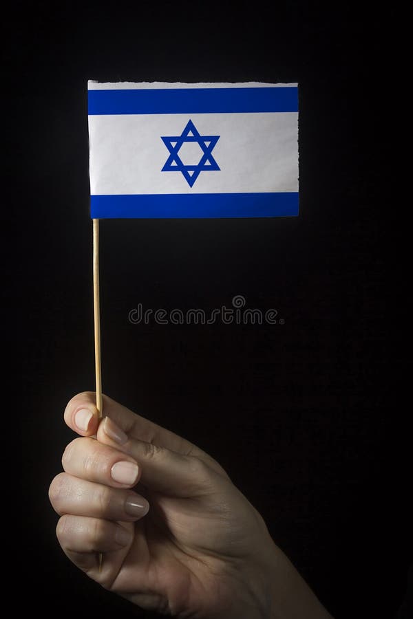 Hand with flag of Israel stock image. Image of nation - 197416301