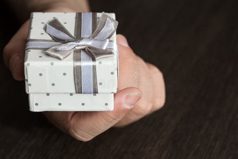 Hand with small present stock photo. Image of holiday - 89693134