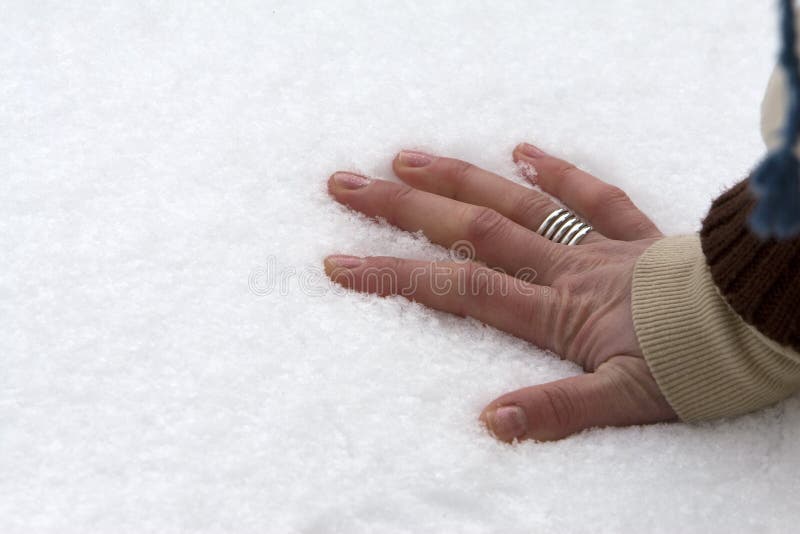 Hand On Snow stock image. Image of macro, winter, nails - 8994747