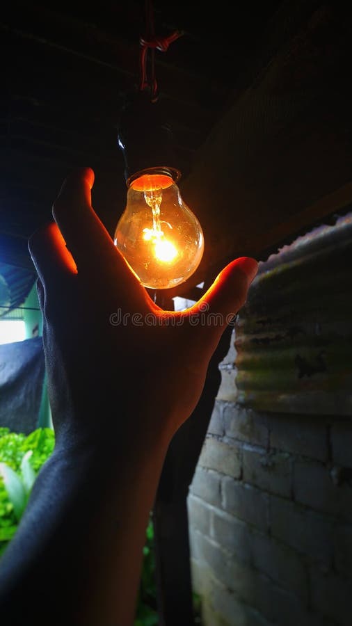 The Hand of Someone Who Wants To Hold a Light Bulb Stock Image - Image ...
