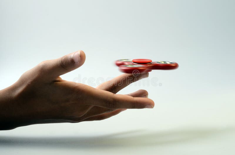 Hand Spinner, Fidgeting Hand Toy Stock Photo - Image of fidgeting ...