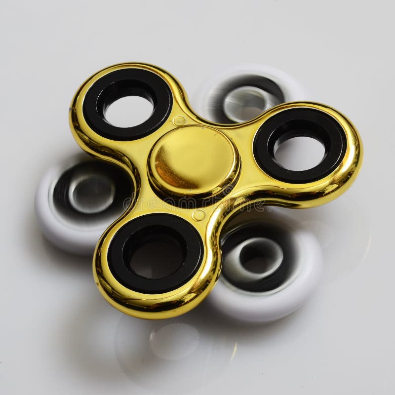 Hand Spinner, Fidgeting Hand Toy Stock Photo - Image of yellow ...