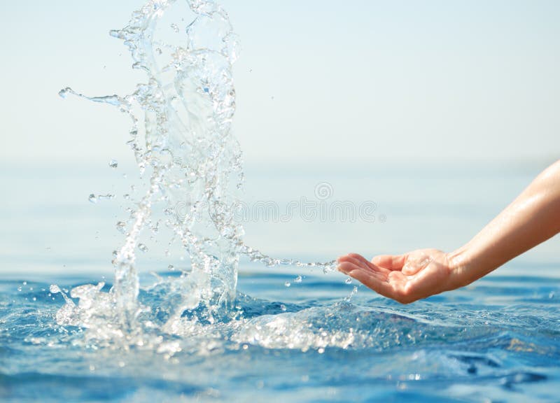 Hand Splashing Clean Water in Sun Rays Stock Photo - Image of frozen ...