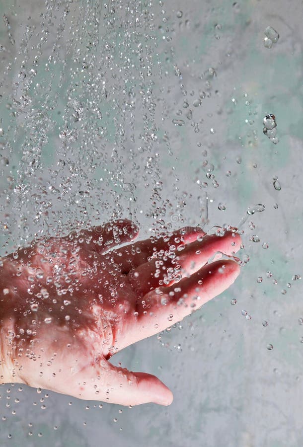 Hand and splashing water stock image. Image of finger - 14442287