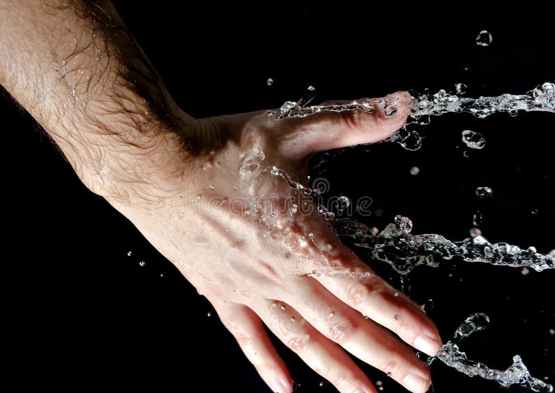 Hand and splashing water stock image. Image of isolated - 19432763
