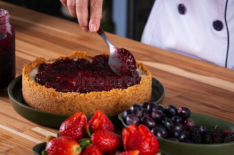 Hand with Spoon Spreading Berry Jam on Sweet Pie Stock Image - Image of ...