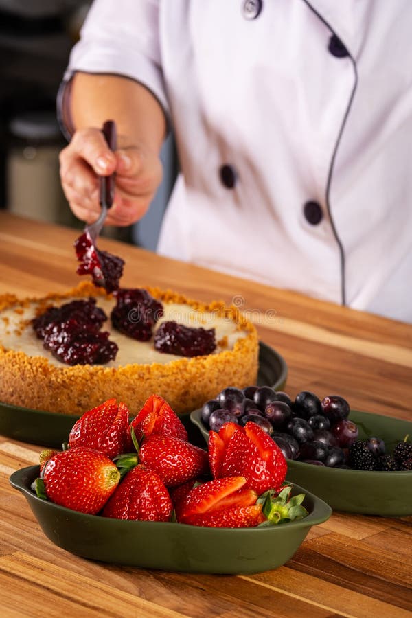 Hand with Spoon Spreading Berry Jam on Sweet Pie Stock Image - Image of ...