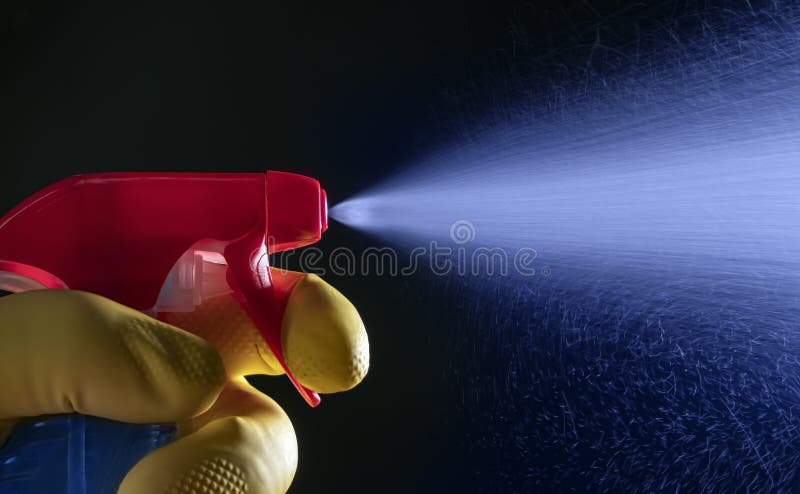 Hand with a Spray Bottle on a Dark Background Stock Photo - Image of ...