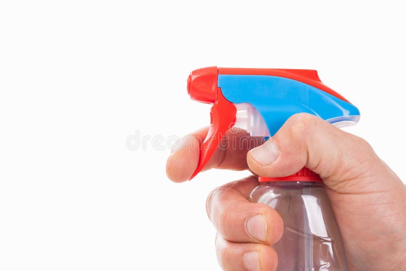 A hand with spray bottle stock photo. Image of detergent - 65667920