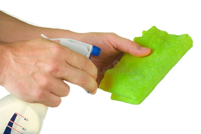 Hand With Spray Bottle And Rag Stock Photo - Image: 16567160