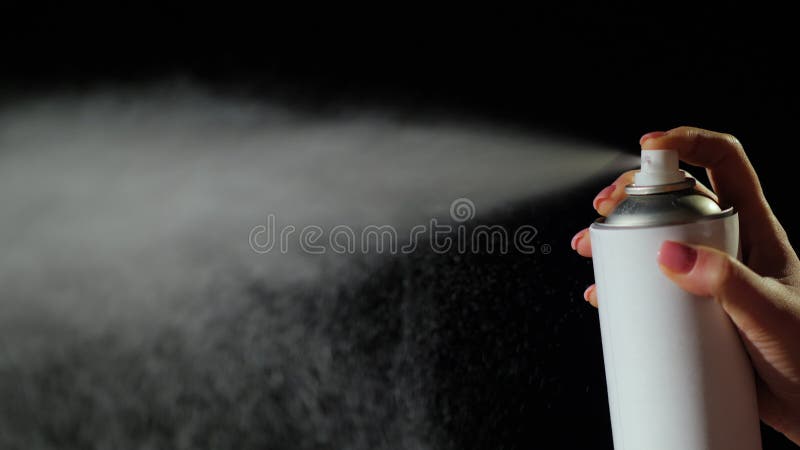 Hand with a Spray Can Sprays it on a Black Background Stock Video ...