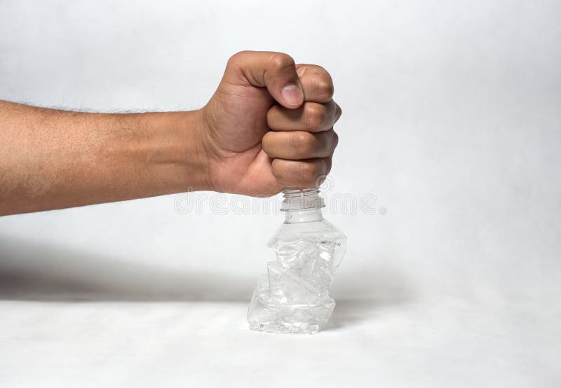 Hand Squashing Empty Plastic Bottle Stock Photo - Image of reuse ...