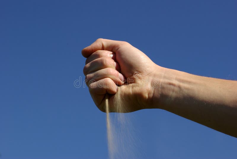 Sand Spilling Out of the Hand. Concept of the Transience of Time ...