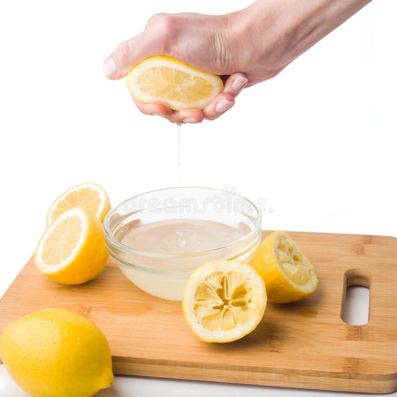 Squeeze Lemon Juice Hand Stock Photos - Download 592 Royalty Free Photos