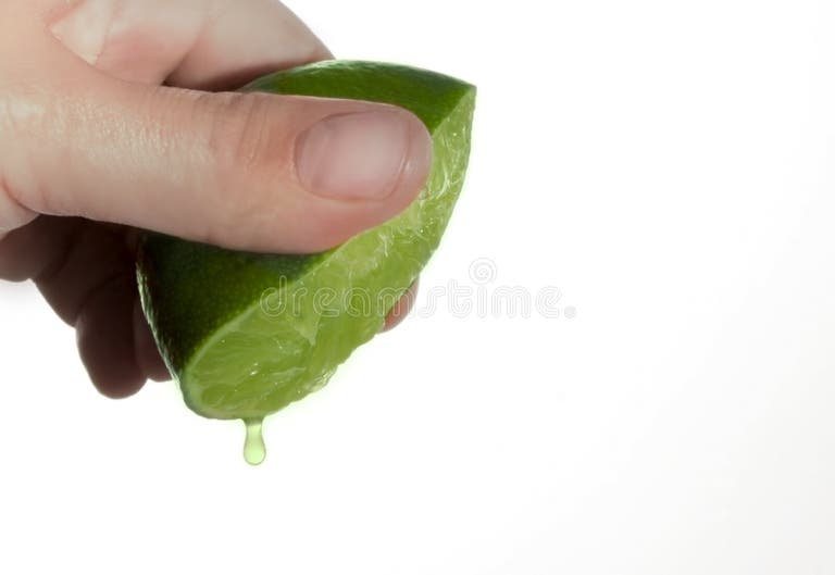 Hand Squeezing a Drop of Lime Stock Photo - Image of crisp, food: 2788564