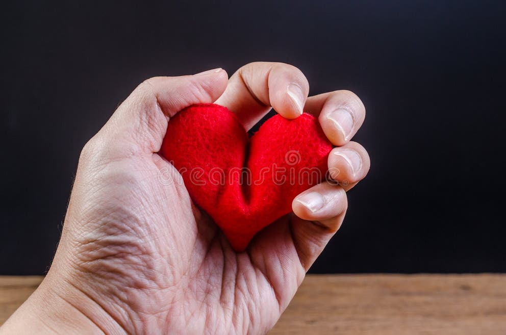Hand Squeezing Red Heart ,heart Attack , Love Problem Concept Stock ...