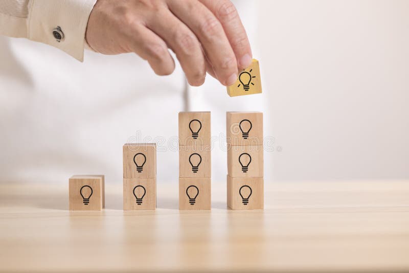 Hand Stack Wooden Blocks with Thinking and Idea Icon To Graph. Stock ...