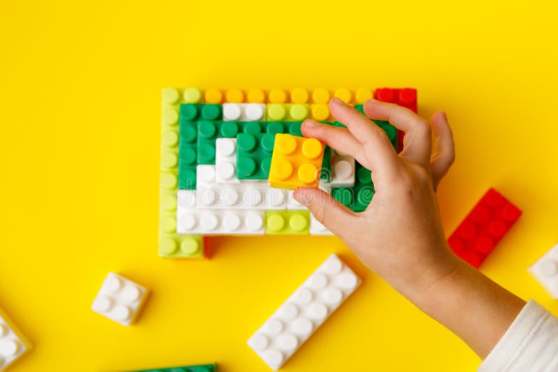 Hand Stacking Up the Colorful Plastic Block. Stock Photo - Image of ...